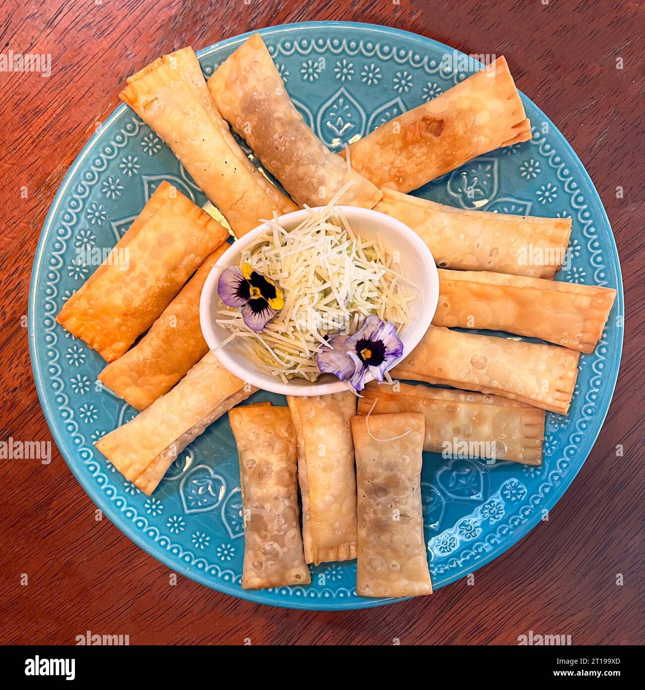 Traditional Peruvian tequenos with guacamole (Fried Cheese Sticks with ...