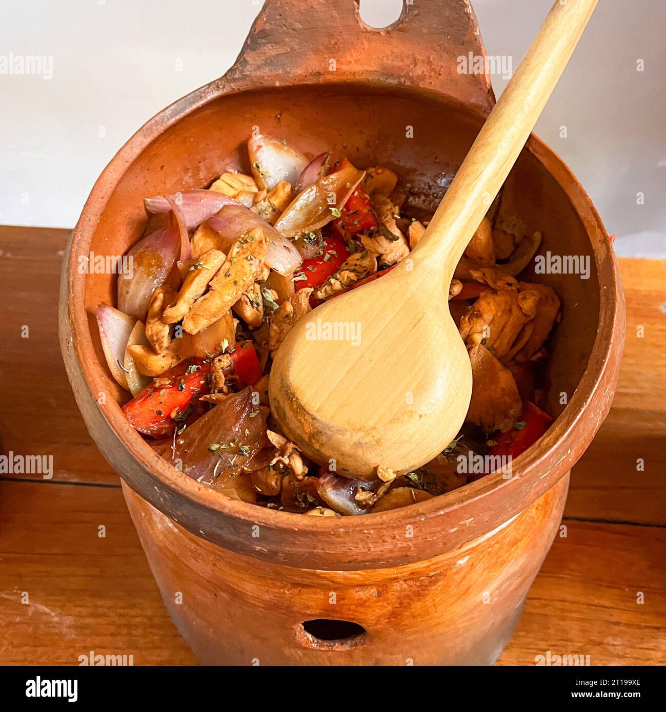 Traditional clay pot Peruvian chicken with vegetables Stock Photo - Alamy