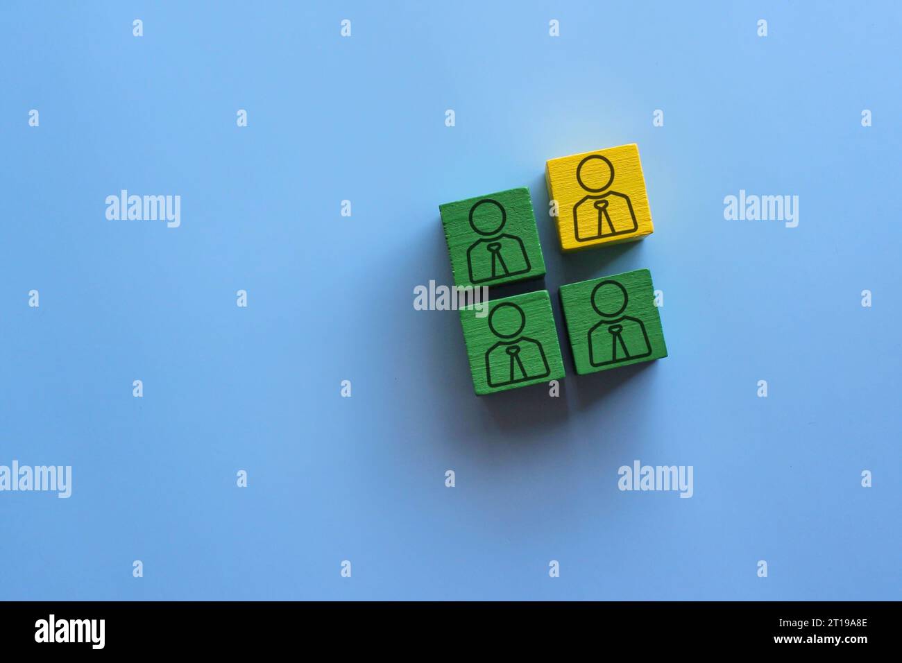 Wooden blocks with people icon on a blue background. Togetherness ...