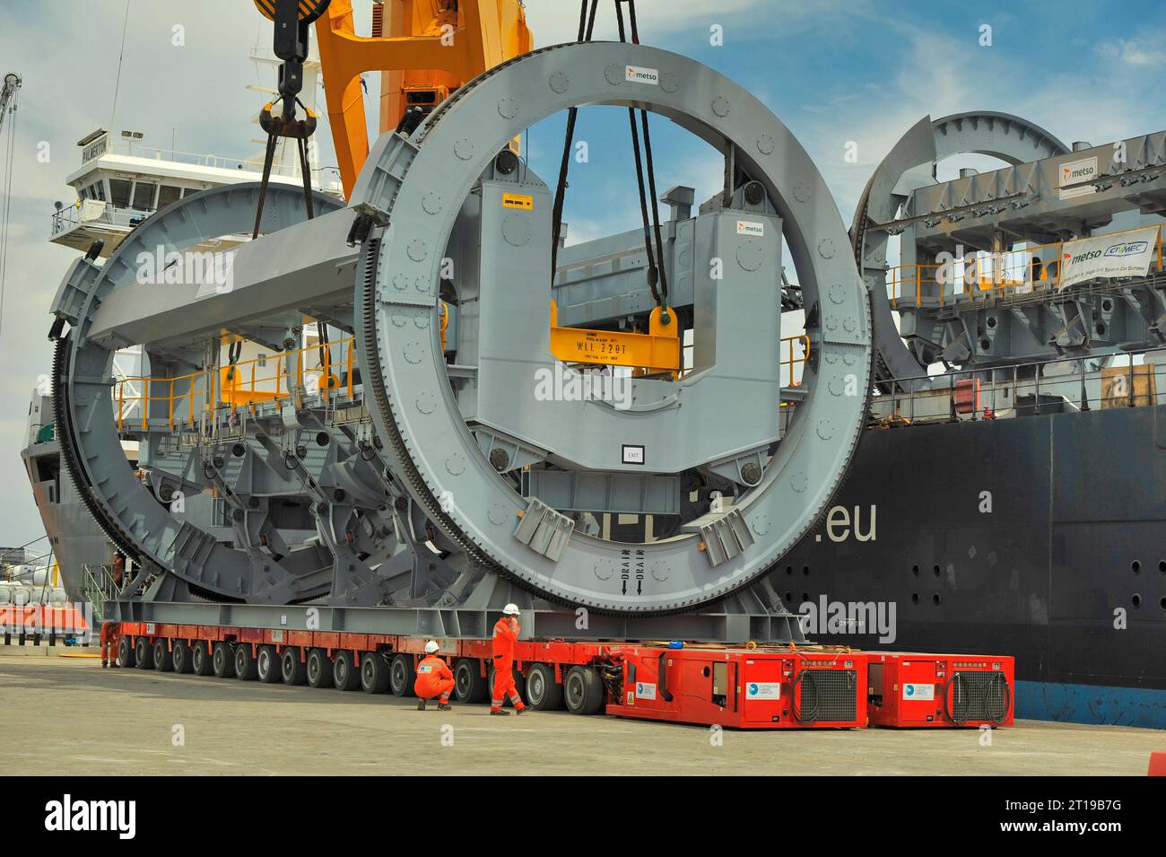 A newly constructed rail car dumper being loaded on to a shipping ferry ...