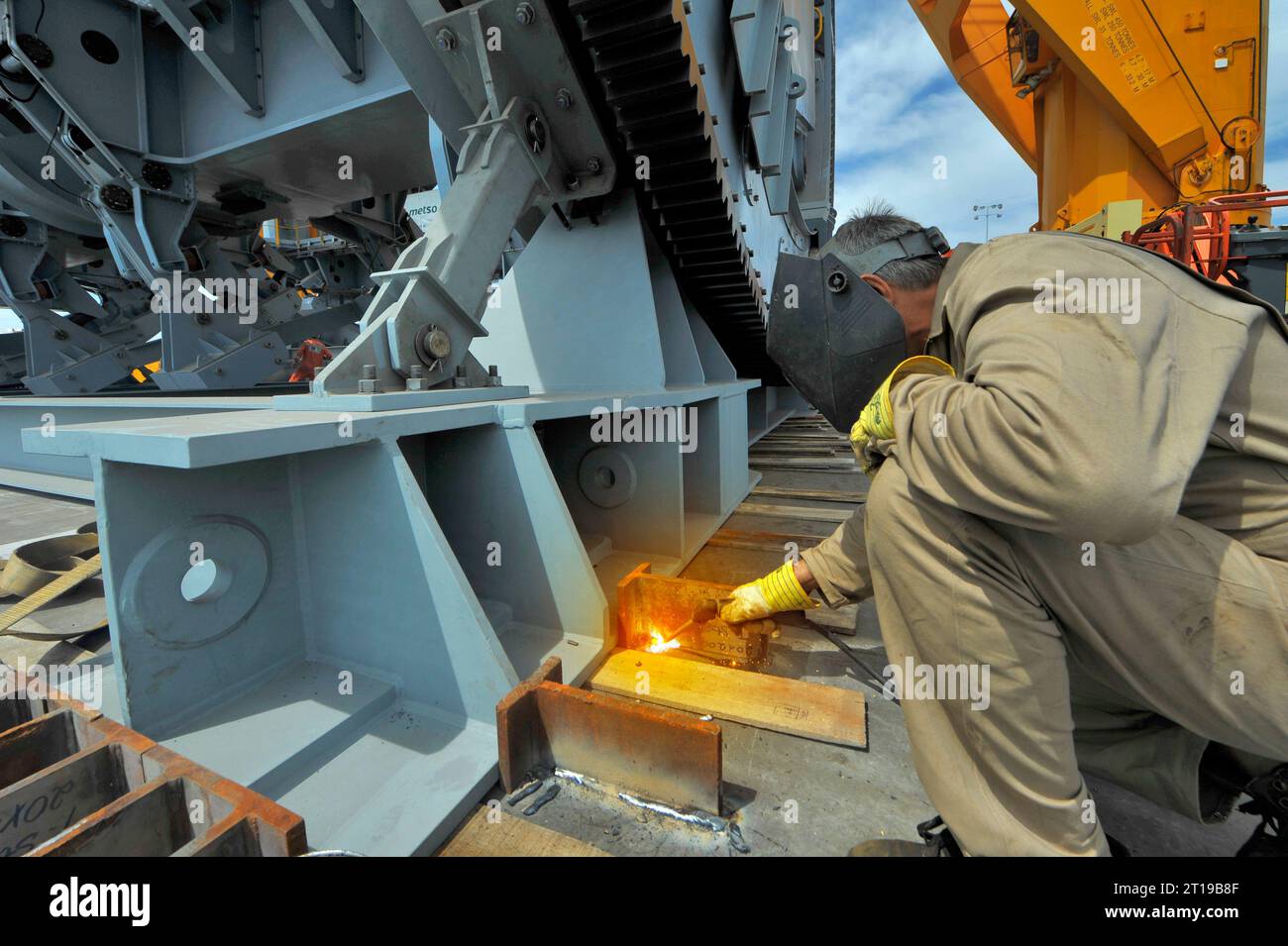 A newly constructed rail car dumper being loaded on to a shipping ferry ...