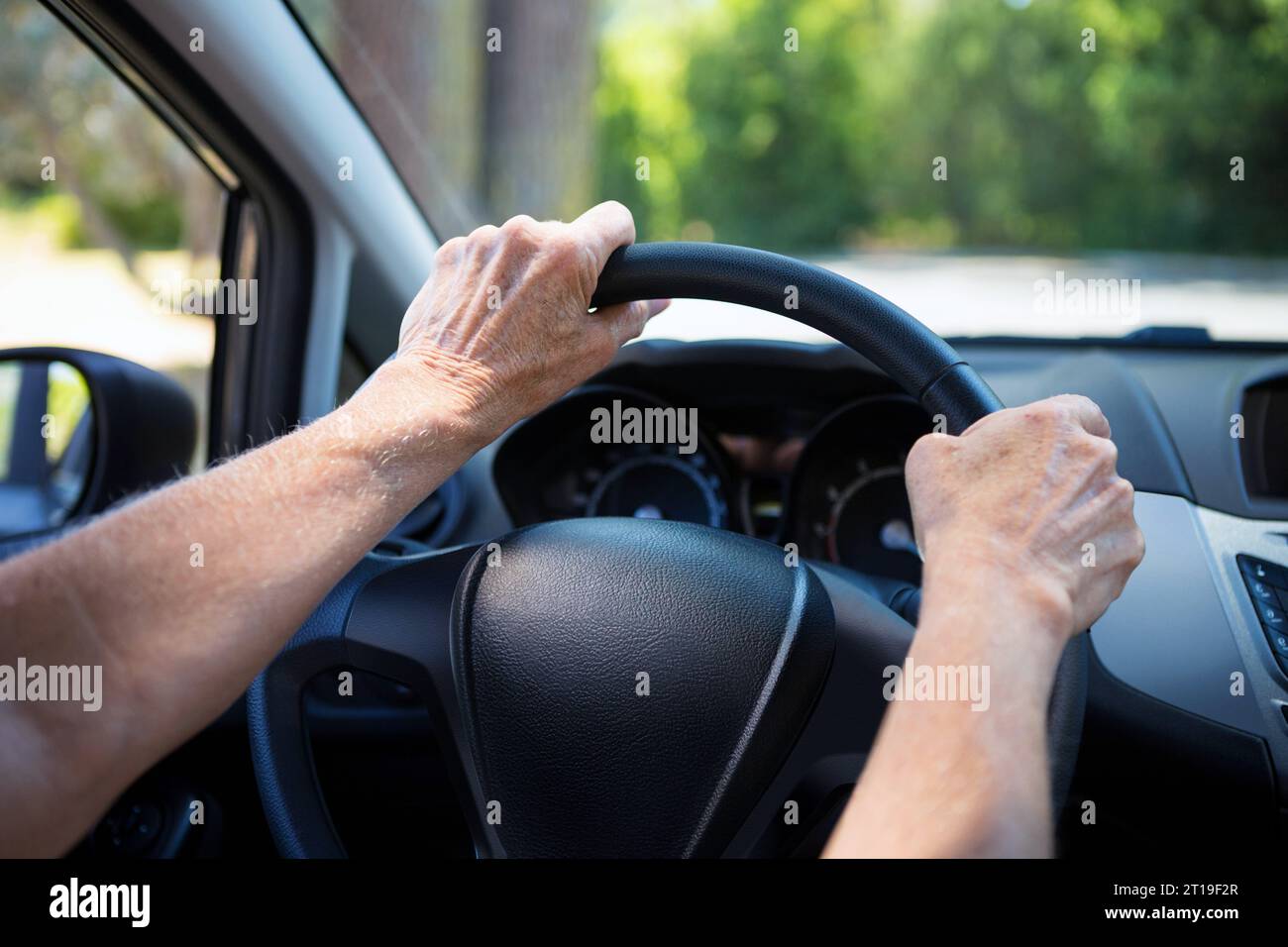 Car driving background. Steering wheel with driver's hands Stock Photo ...