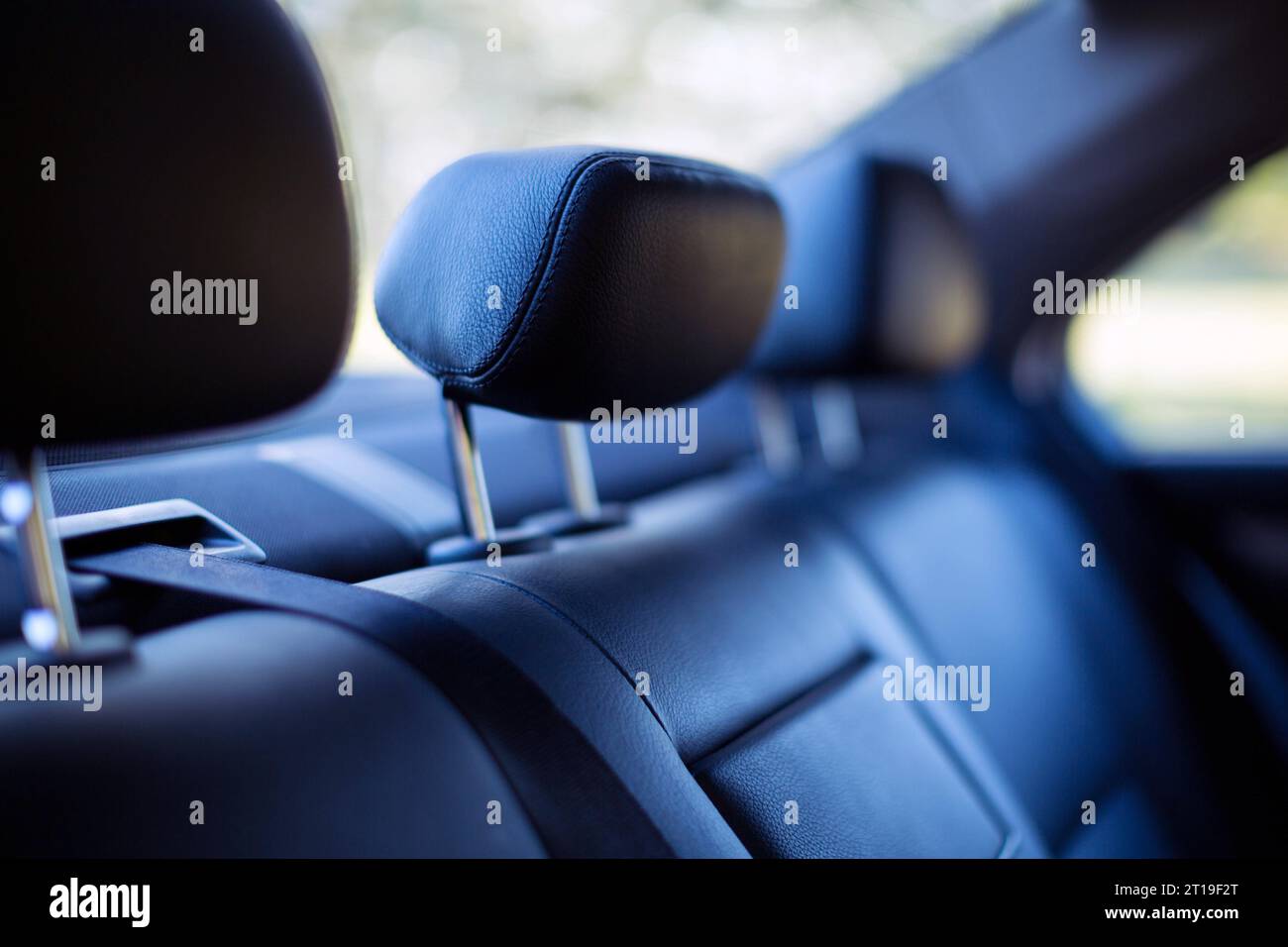 Back seat of a modern city car background Stock Photo - Alamy
