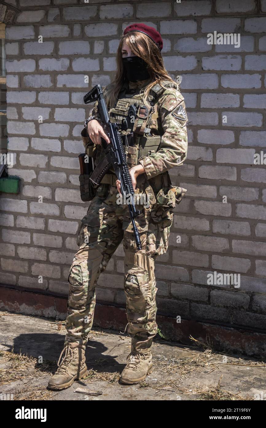 Donbas, Ukraine - July 17, 2023 Portrait of a Belarusian female soldier ...