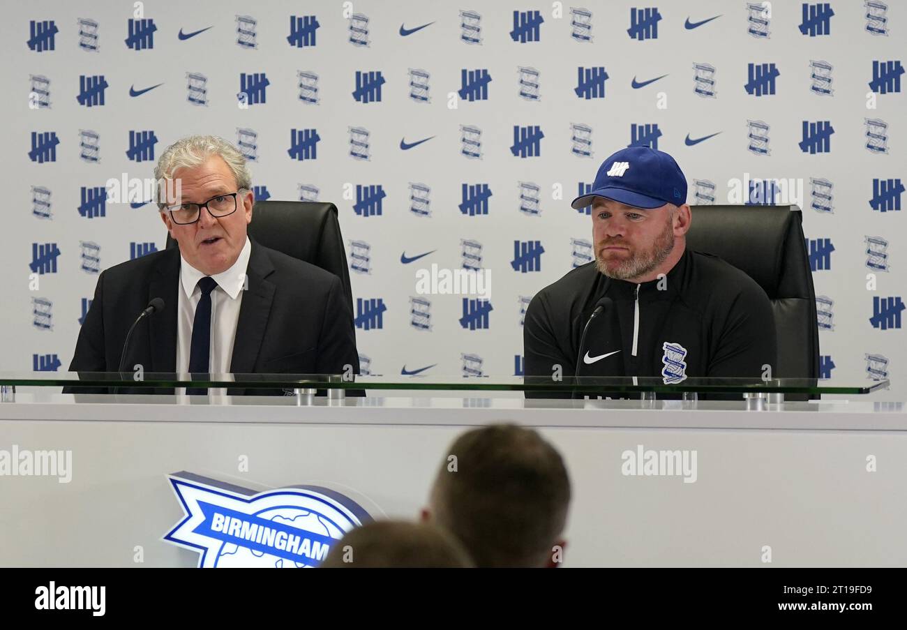 New Birmingham City manager Wayne Rooney (right) with club CEO Garry ...