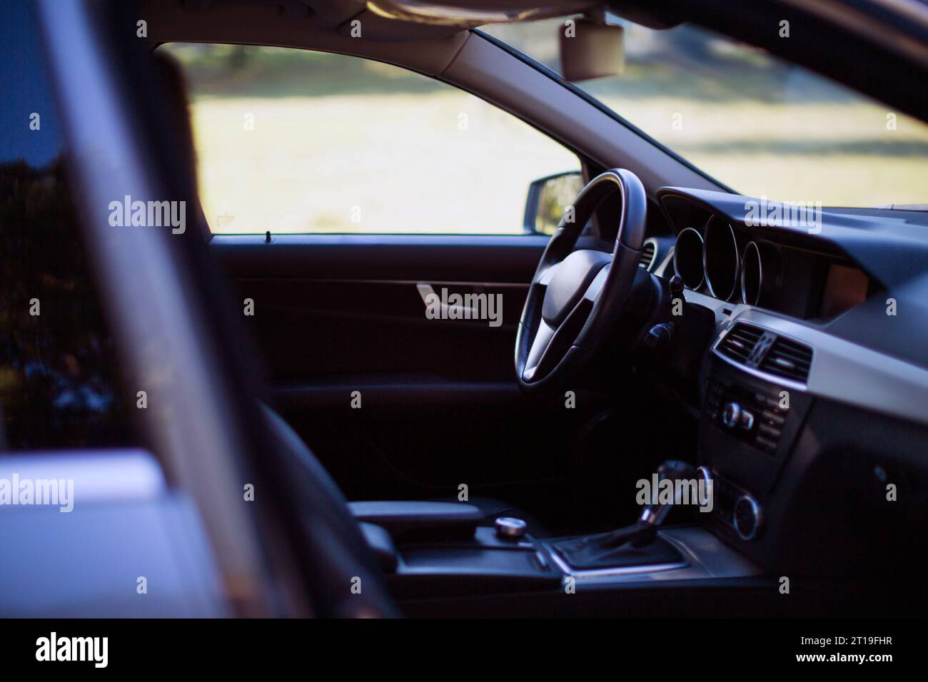 Inside a modern car view, city car interior background. Shift lever ...