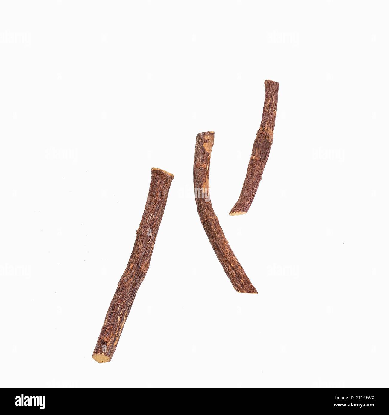 Glycyrrhiza glabra - Dried medicinal licorice sticks Stock Photo - Alamy