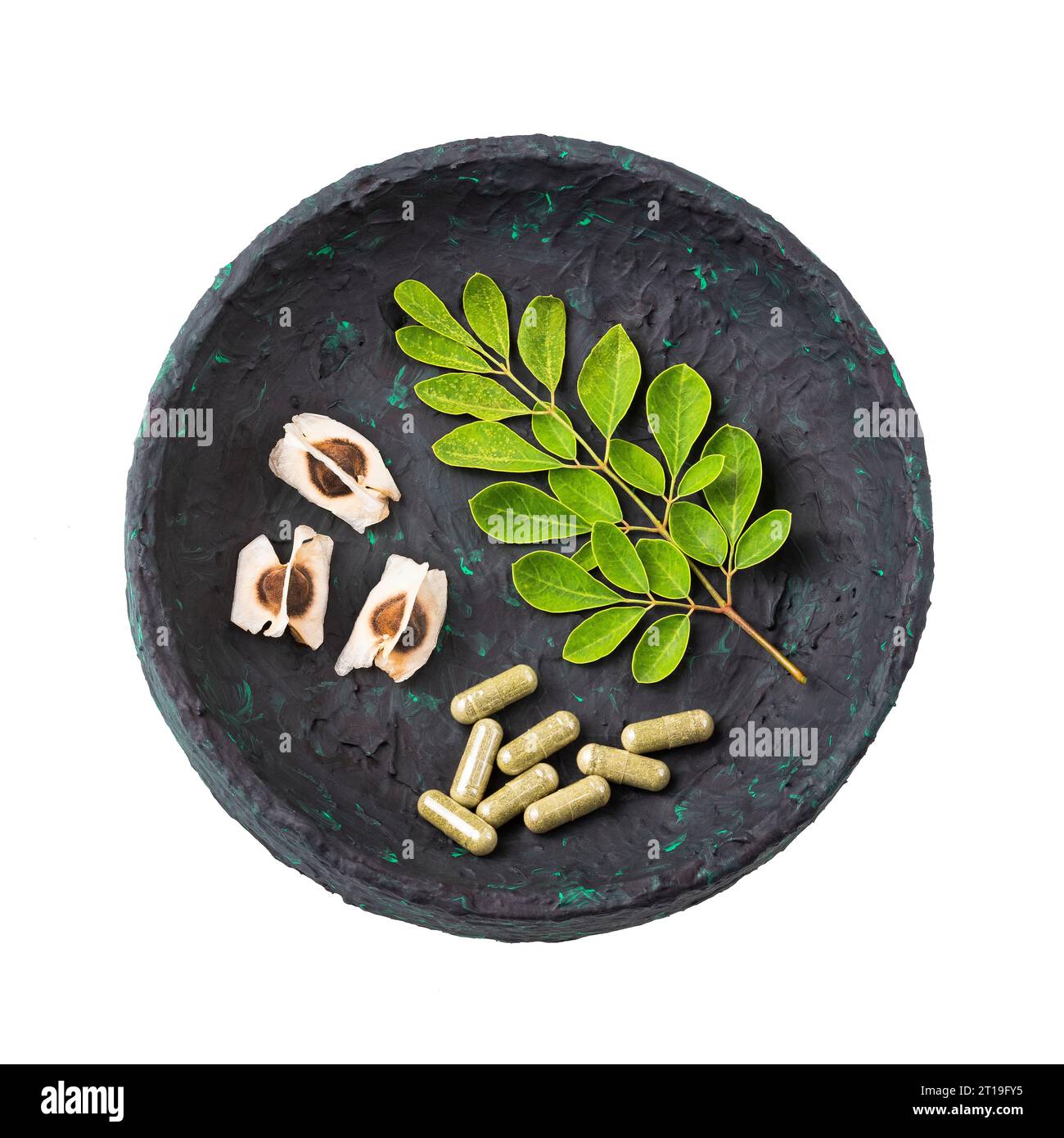 Moringa leaves, seeds and capsules - Moringa oleifera Stock Photo - Alamy