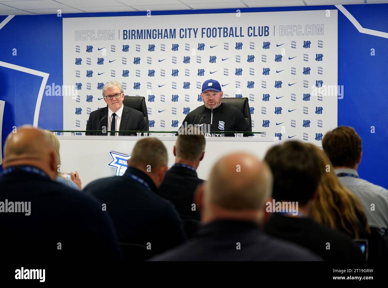 New Birmingham City manager Wayne Rooney (right) with club CEO Garry ...