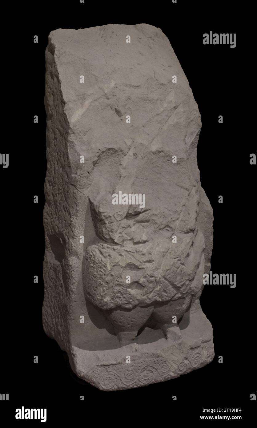 Heavily damaged stone statue which probably depicted a figure of the ...