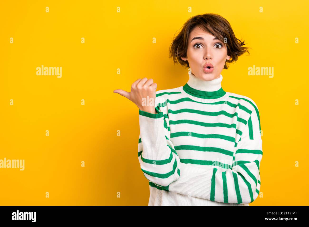 Photo of shiny impressed girl dressed striped sweater showing thumb ...
