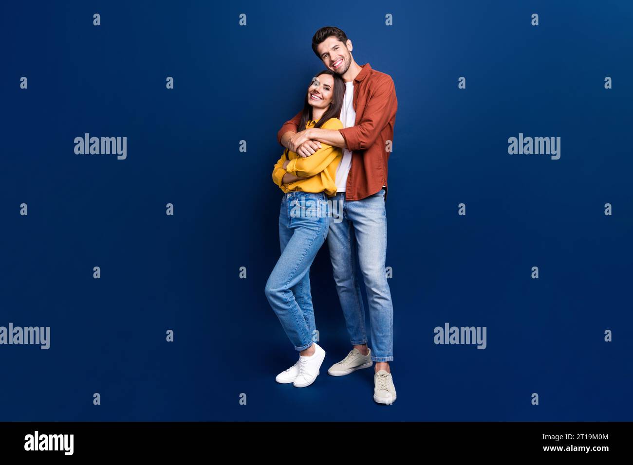 Full size photo of idyllic positive partners cuddle good mood empty ...