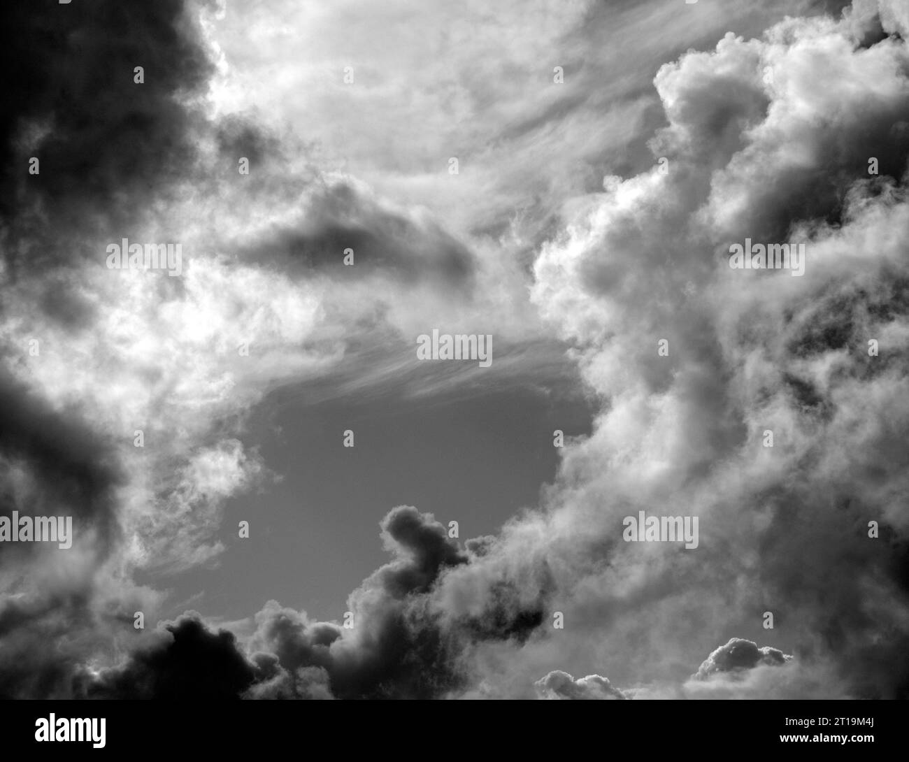 Flight over cumulus clouds view Black and White Stock Photos & Images ...