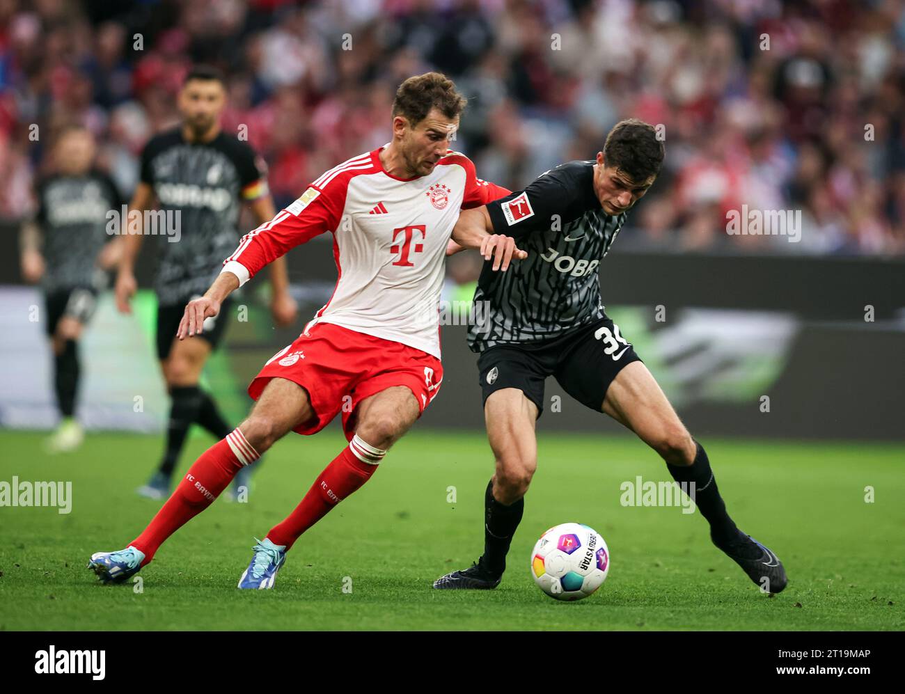 Leon Goretzka of Bayern Muenchen Merlin Roehl of SC Freiburg FC Bayern ...