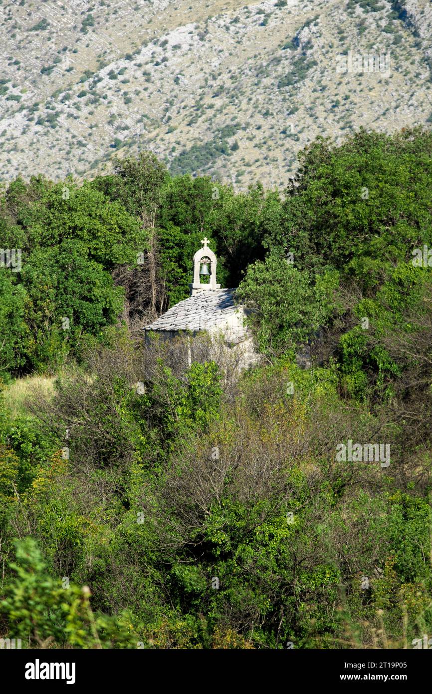 small stone church in a wood of Bosnia and Herzegovina Stock Photo - Alamy