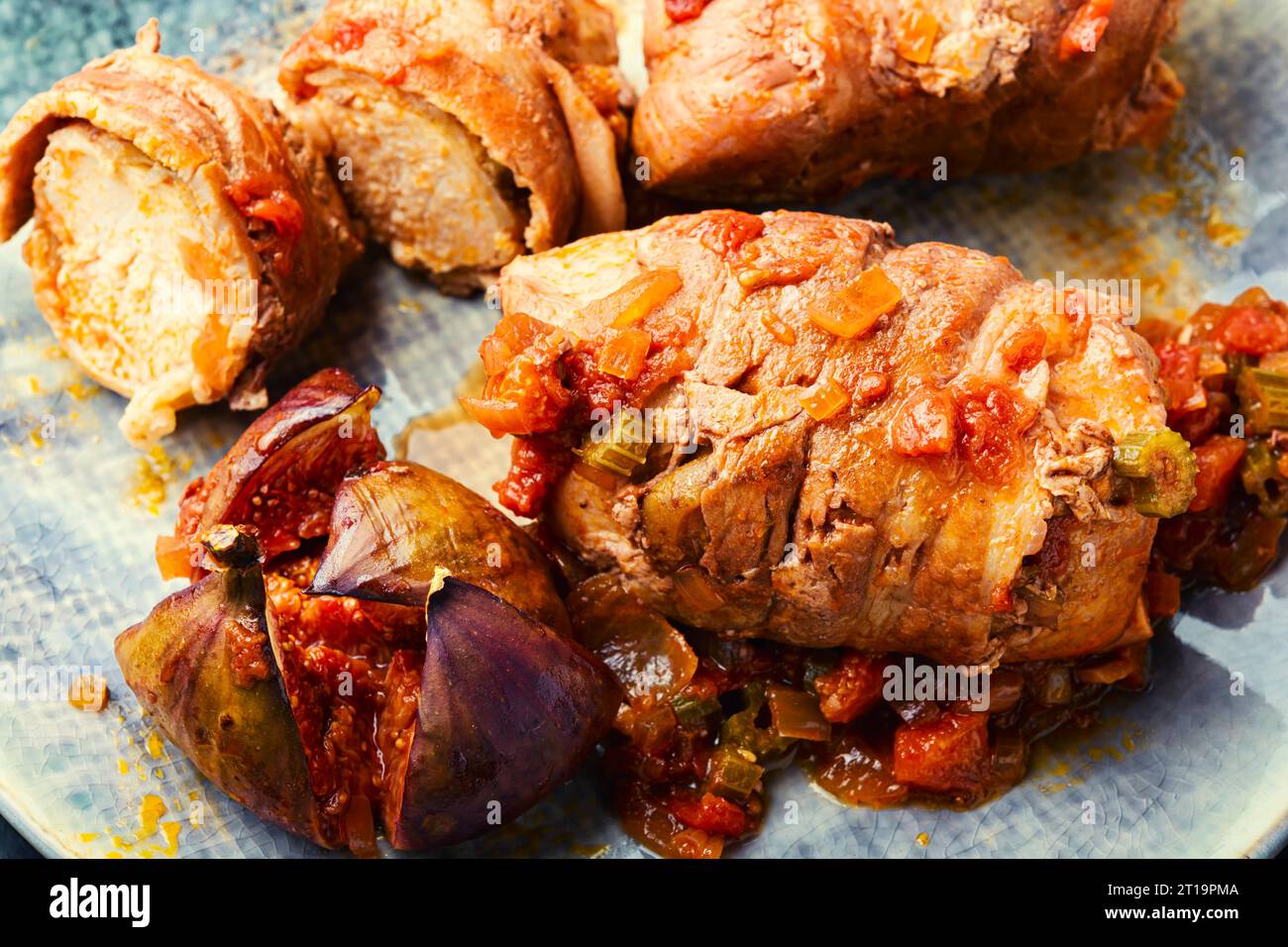 Meat rolls roasted with autumn figs. Close up,macro Stock Photo - Alamy