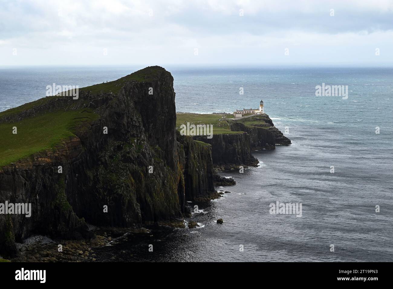 The impressive lighthouse and landscape at Nest Point, Scotland Stock ...