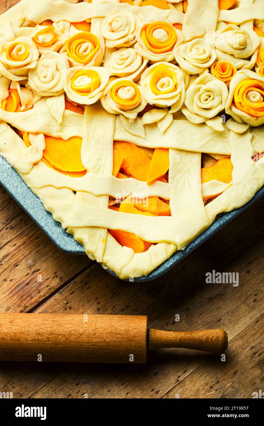 Making traditional pumpkin pie, raw pie.Rustic table Stock Photo - Alamy
