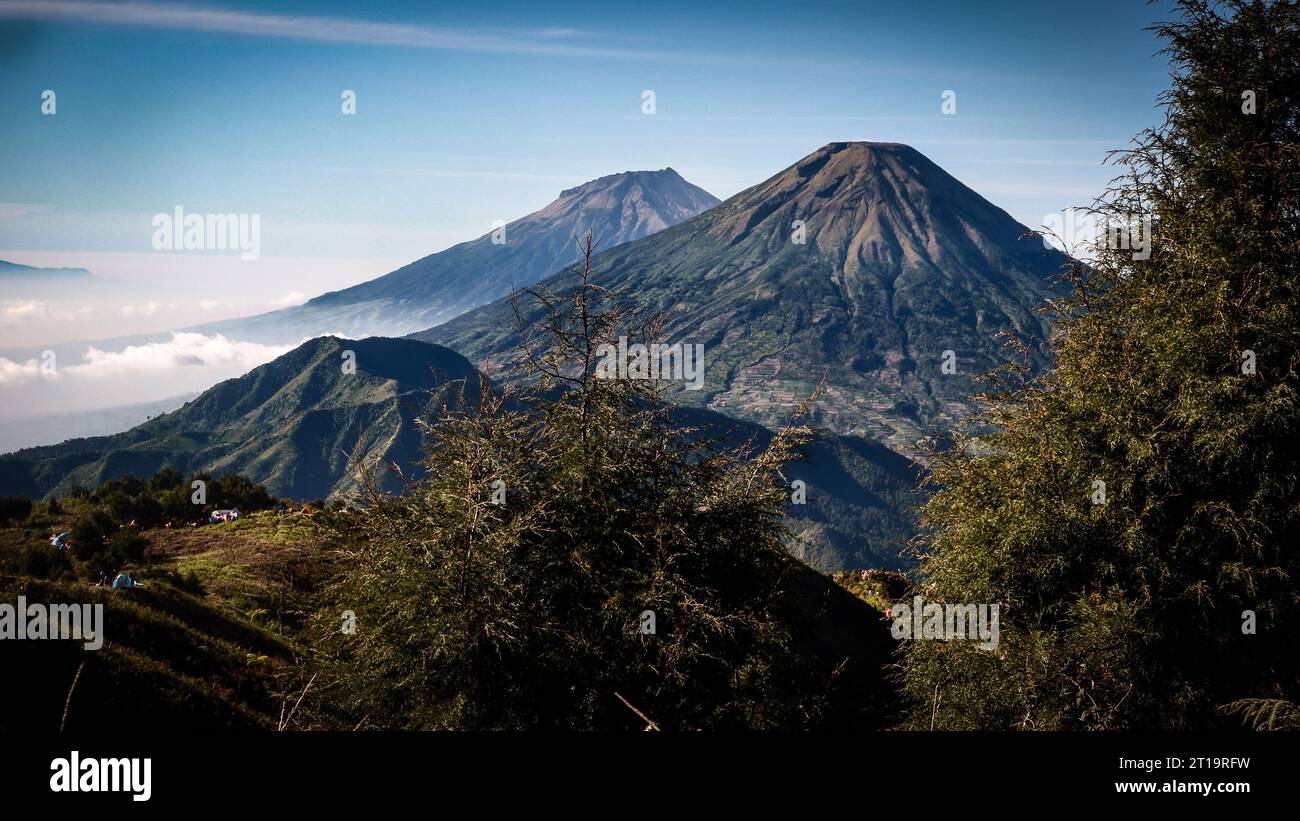 View of the twin mountains, namely Mount Sindoro and Sumbing from the peak of Mount Prau (2565 ...