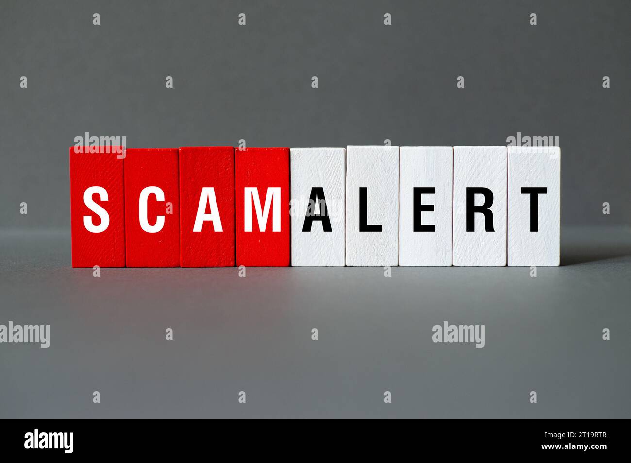 Scam alert - word concept on building blocks, text Stock Photo - Alamy