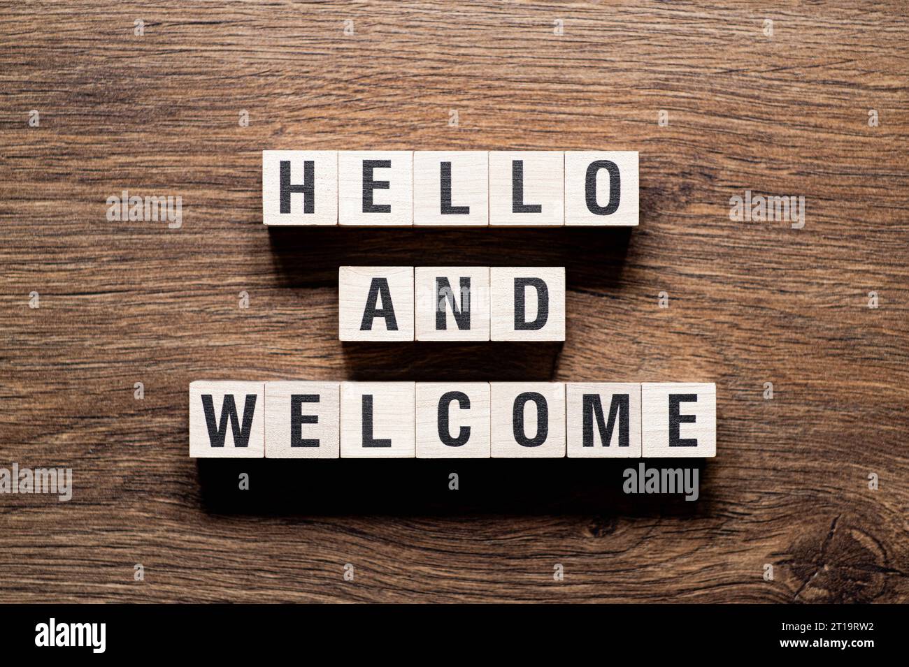 Hello and welcome - word concept on building blocks, text Stock Photo ...