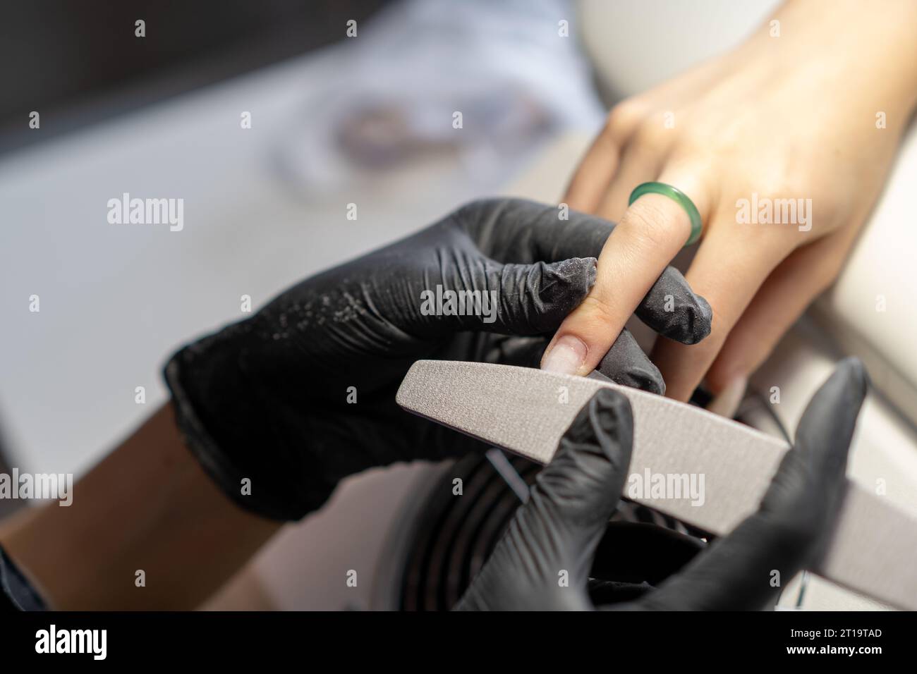 Female hands and tools for manicure, process of performing manicure ...