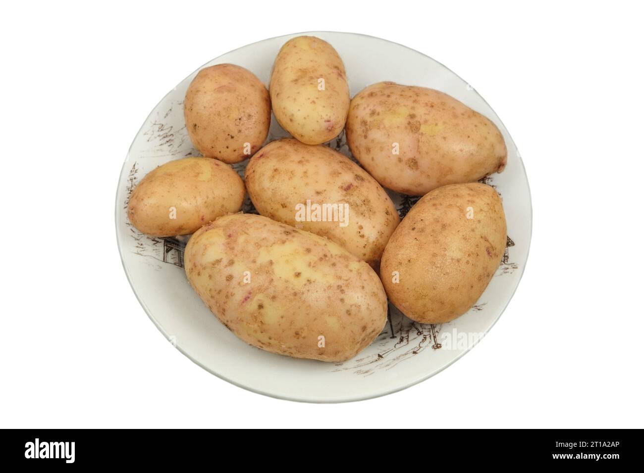 Potatoes in a ceramic dish isolated on white background. Harvesting and ...