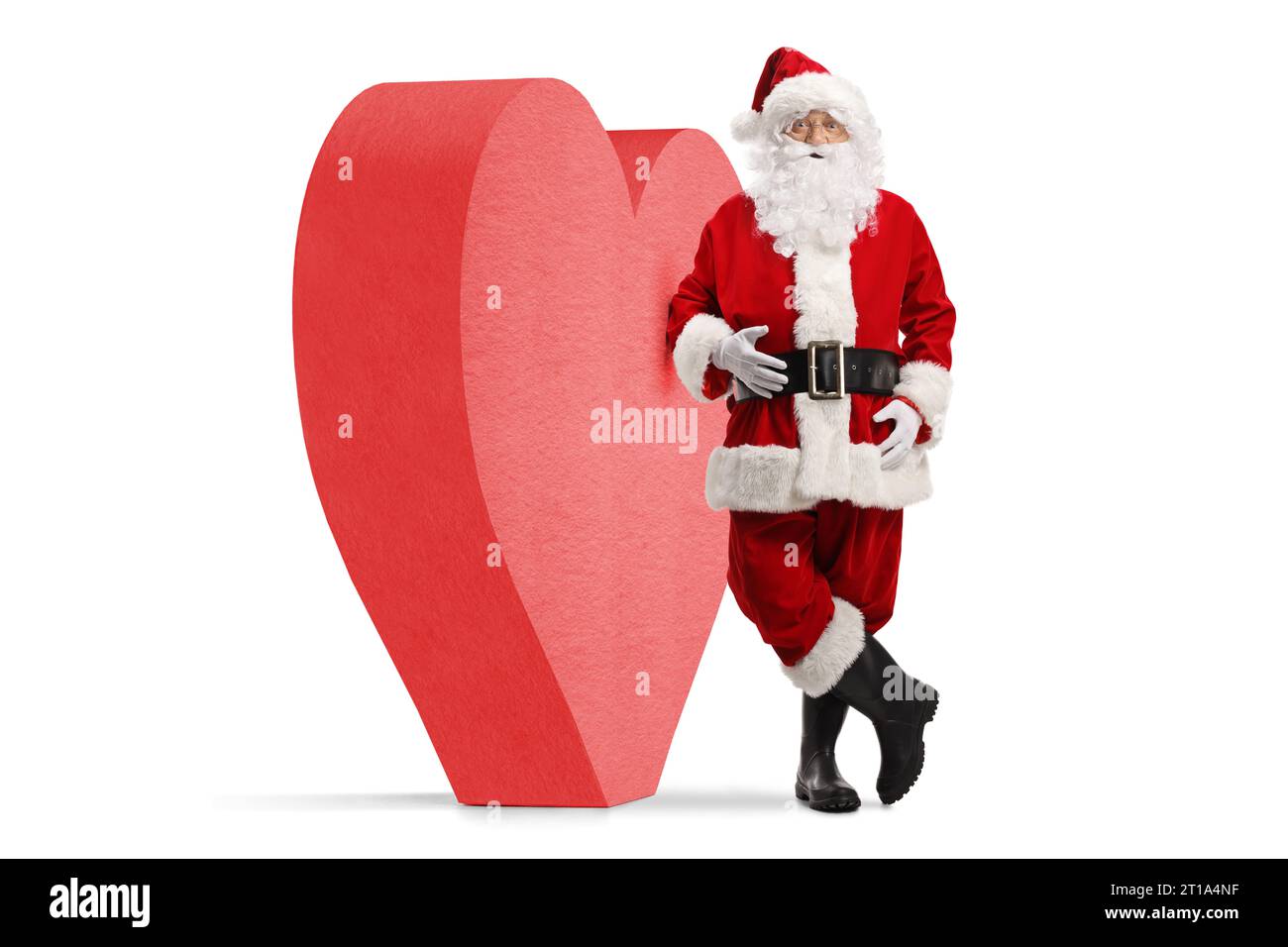 Full length portrait of santa claus leaning on a red heart isolated on ...