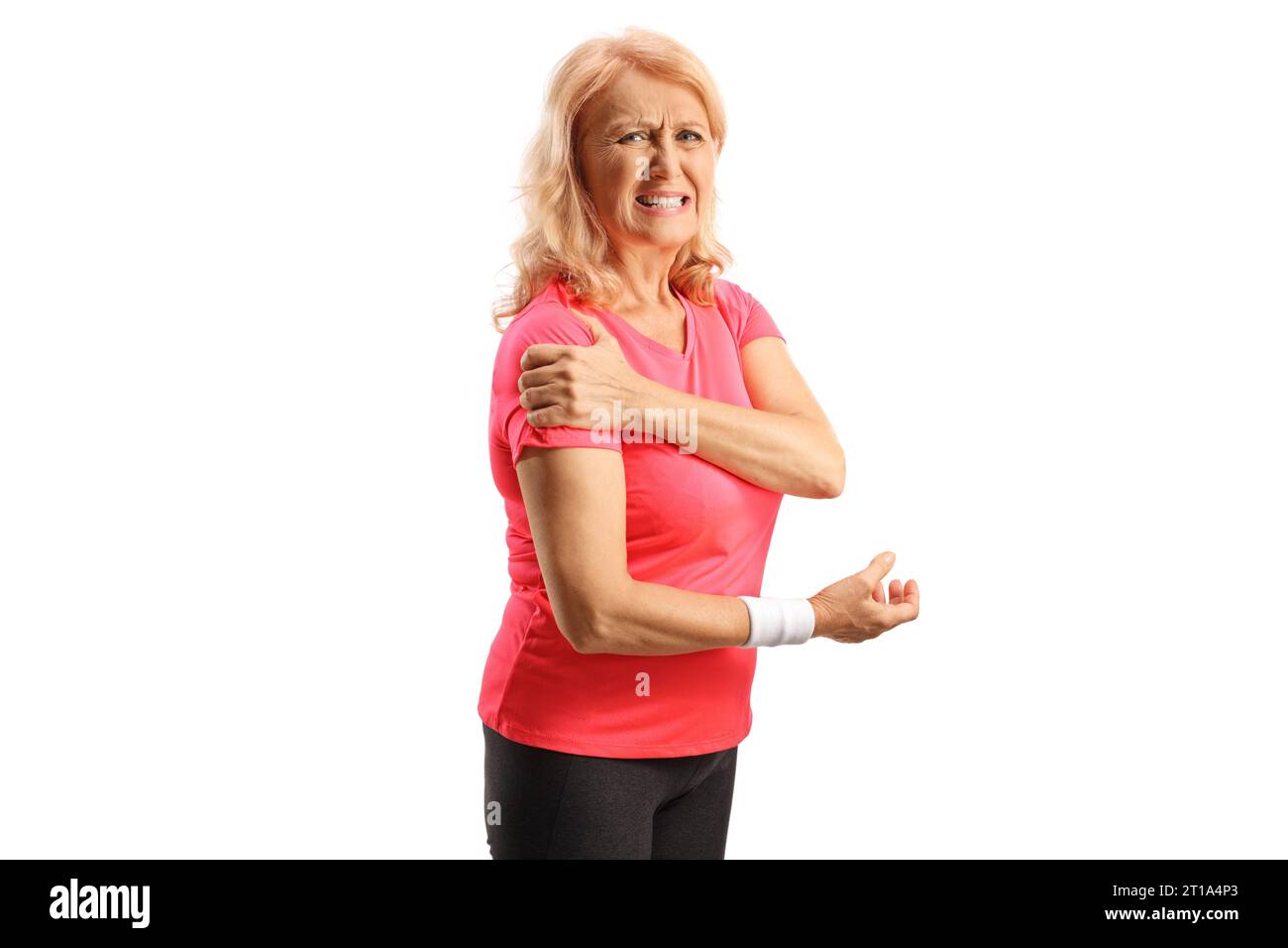 Woman experiencing pain in the shoulder isolated on white background ...