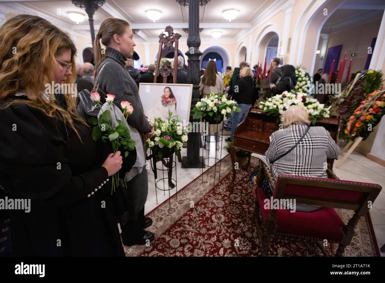 Kyiv, Ukraine. 11th Oct, 2023. People stand in line to sign the book of ...