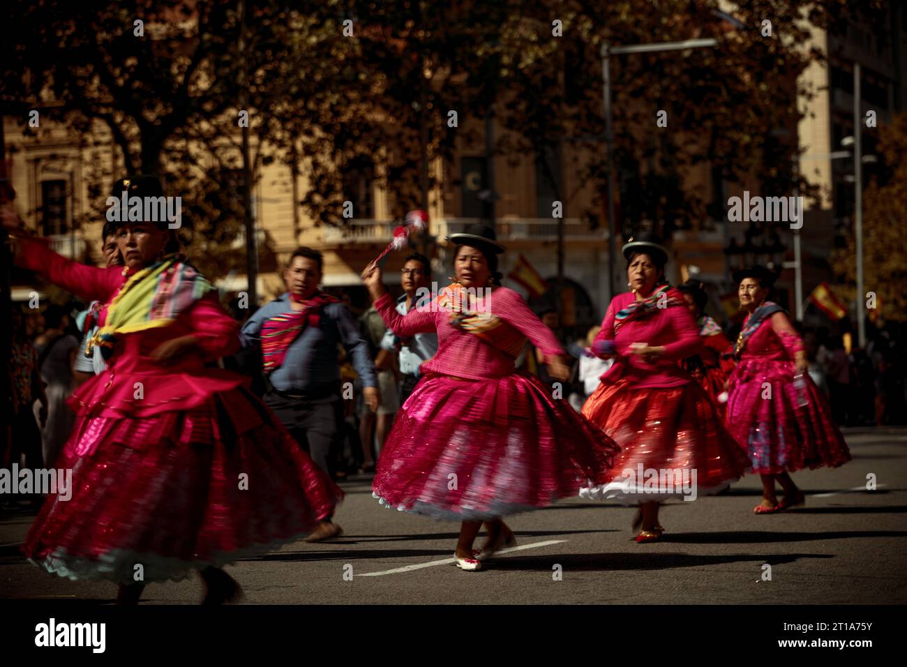 Barcelona, Spain. 12th Oct, 2023. Revelers from various Latin American ...