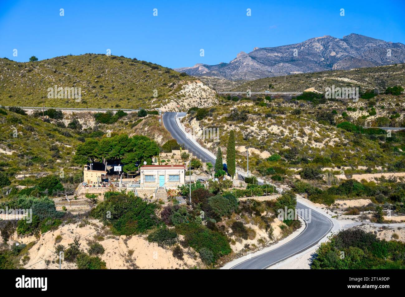 Landscape and scenery with mountains in the distance. A long winding ...