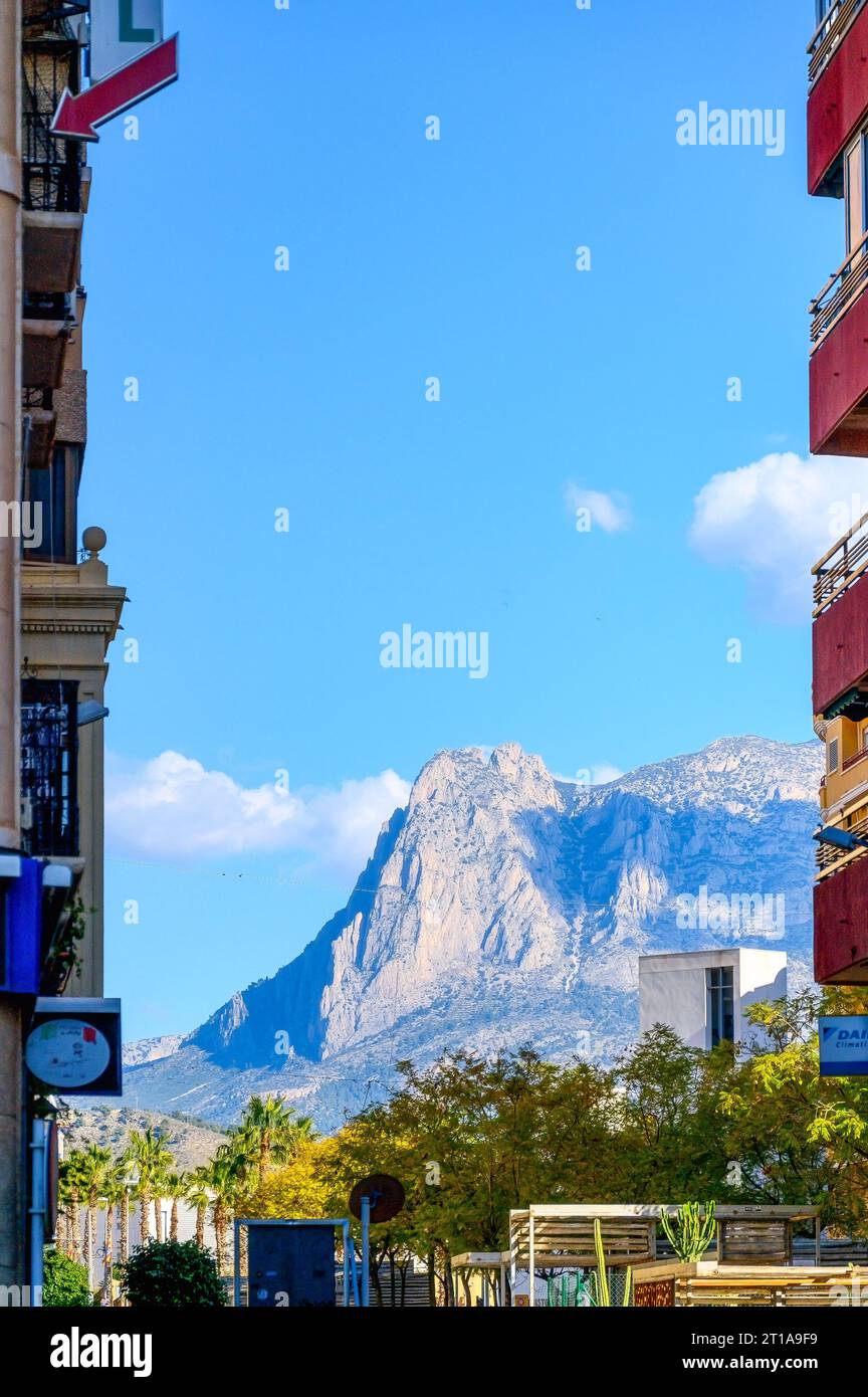 A mountain is framed between two apartment buildings Stock Photo - Alamy