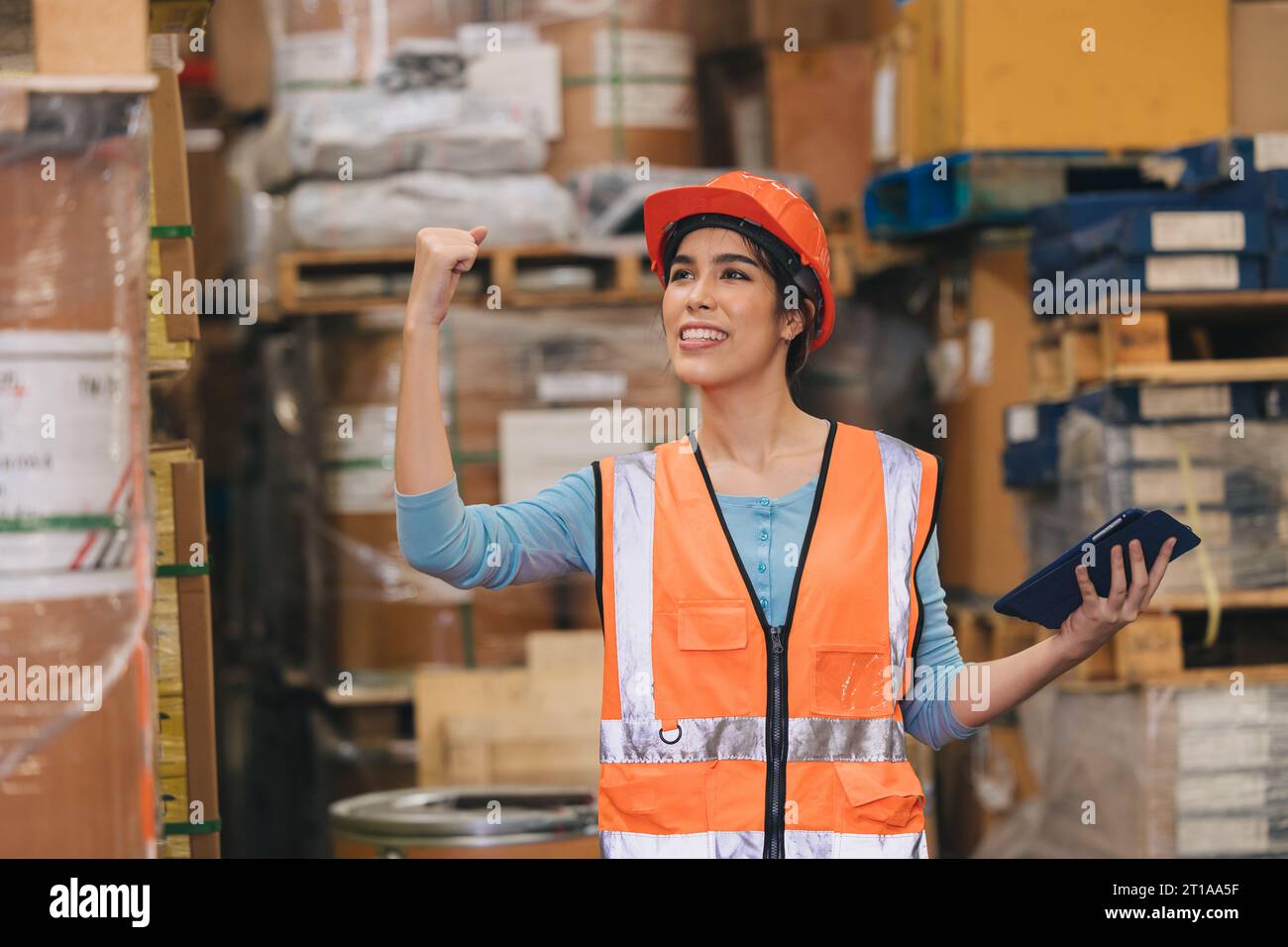 success happy warehouse women worker, Asian strong woman working in ...
