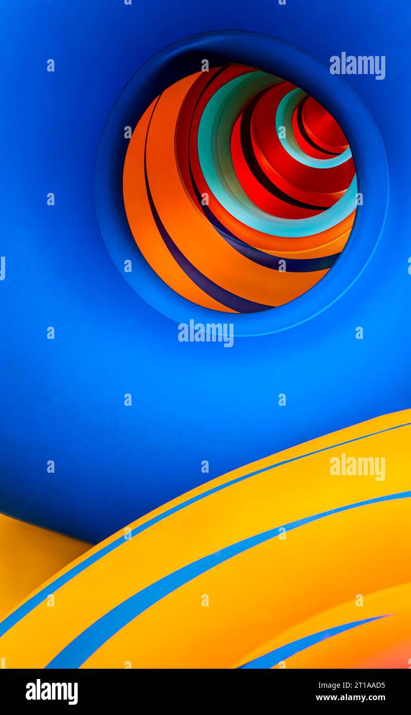 Float tubes stacked up at water recreation facility Stock Photo - Alamy