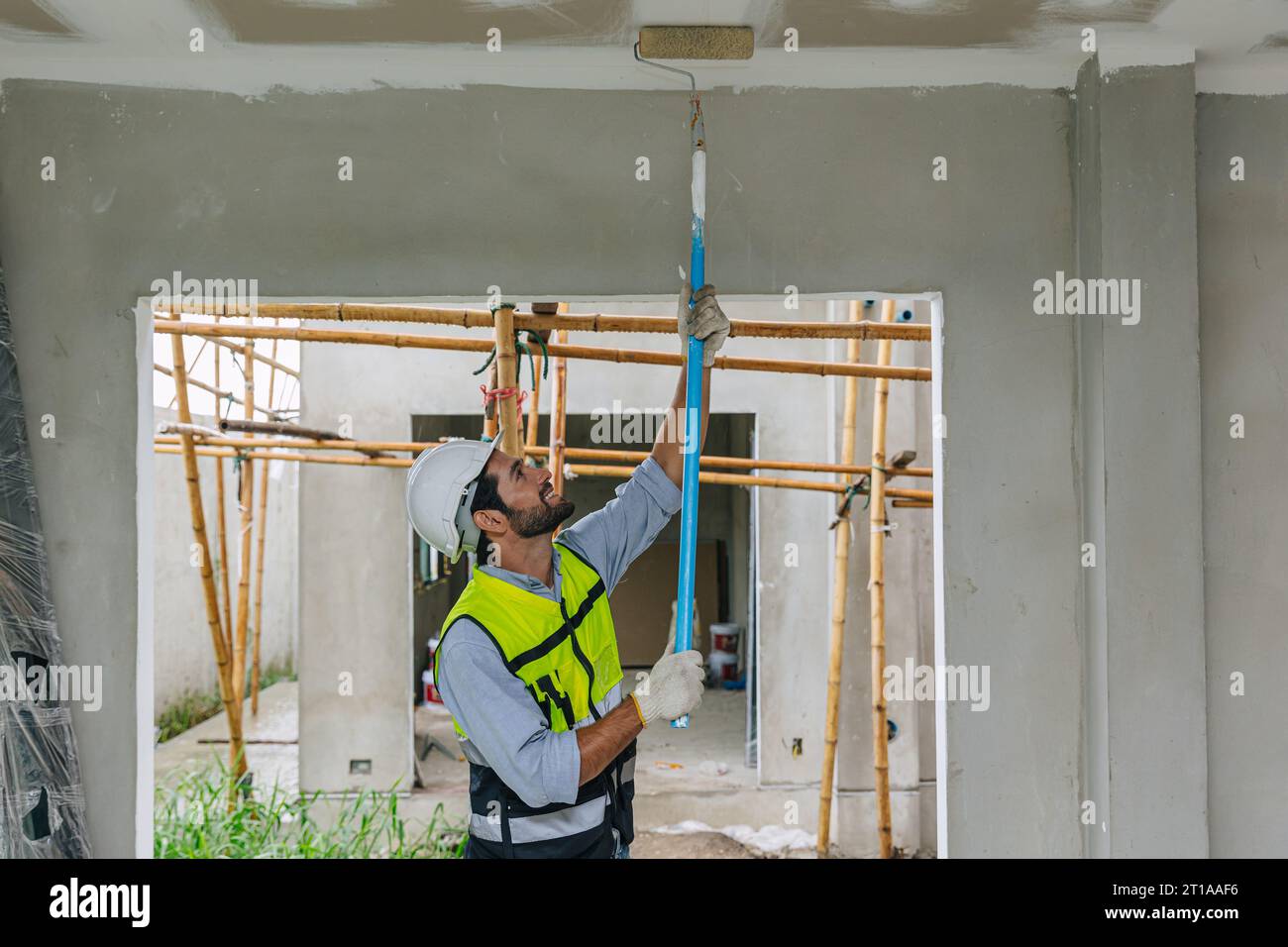 painter worker painting roof work in construction site. contruction ...
