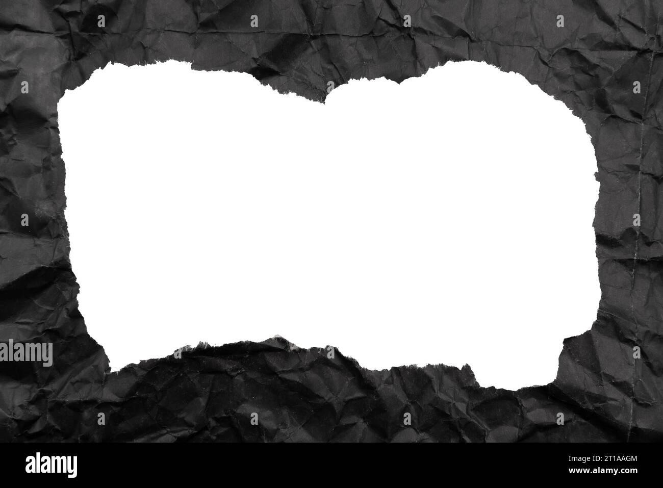 Black paper background with copy space. Hole on a crumpled dark sheet ...