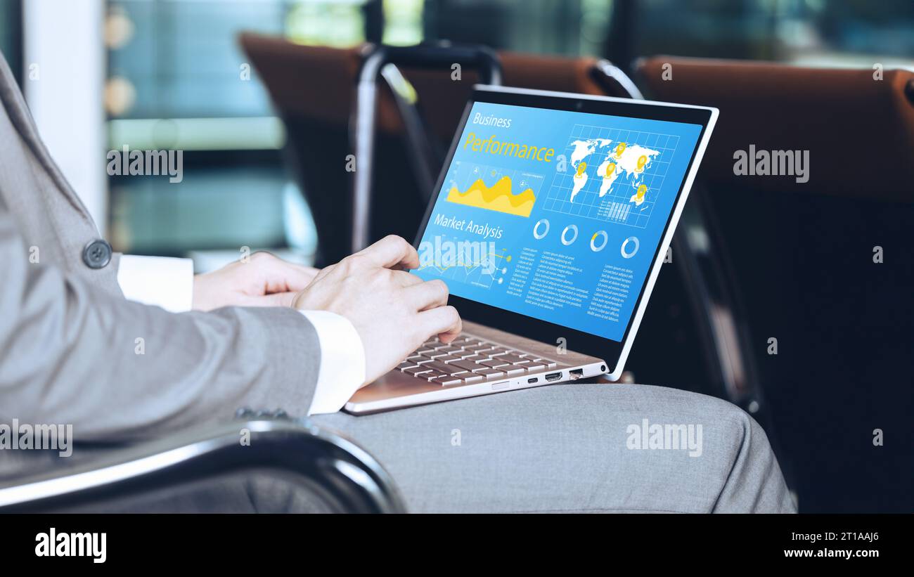 Business wireless working on Laptop computer Analyst Business data report Screen showing ...