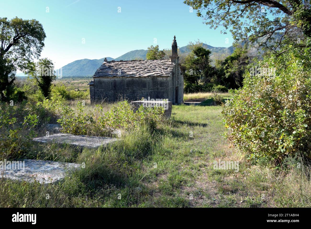 small stone church built with large tombstones called 'stecci' in ...