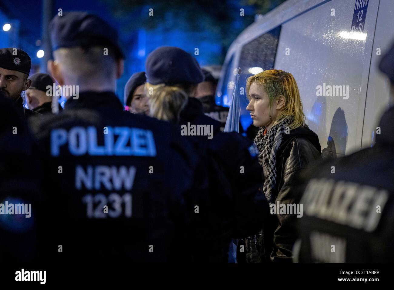 Duisburg, Germany. 12th Oct, 2023. Police take the personal details of ...