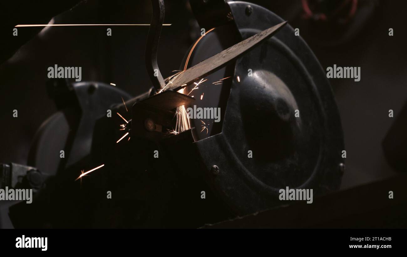 Grinding work with smooth equipment for steel metal, iron. Close-up of ...