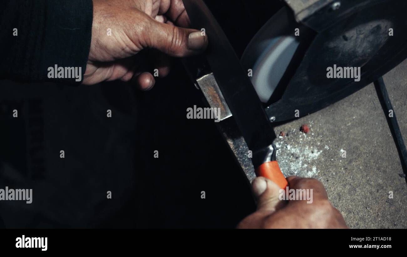 Grinding work with smooth equipment for steel metal, iron. Close-up of ...