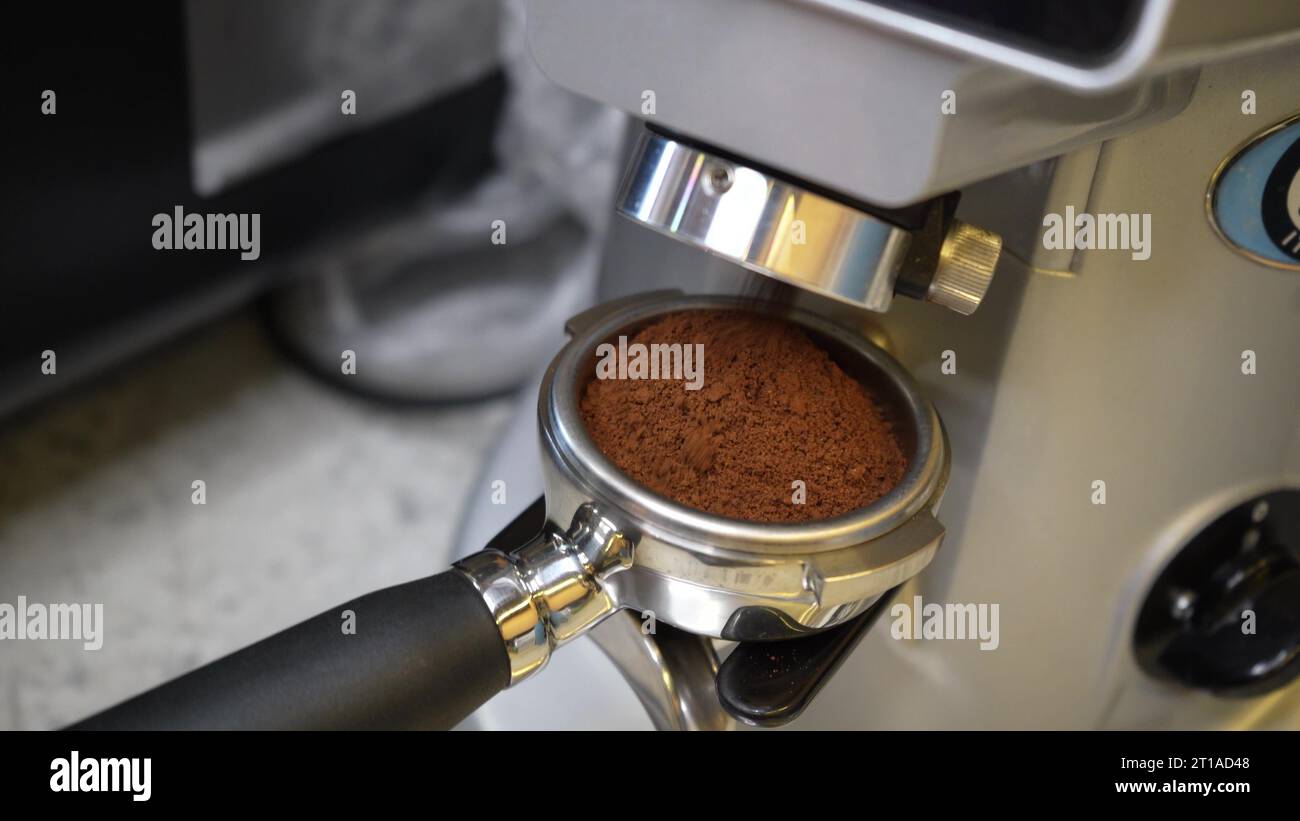 Man pours out coffee beans hi-res stock photography and images - Alamy