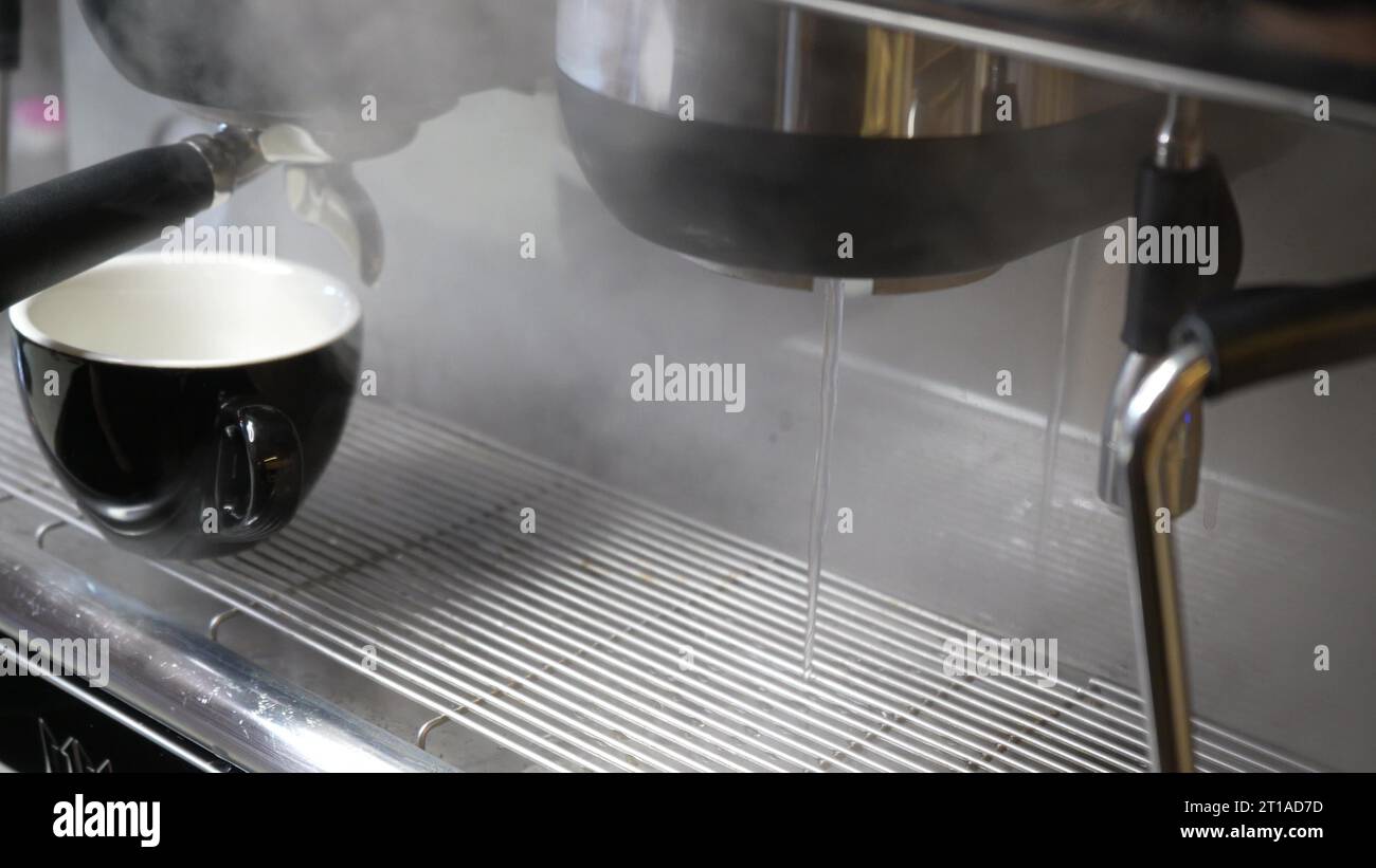 Espresso pouring out coffee machine hi-res stock photography and images ...