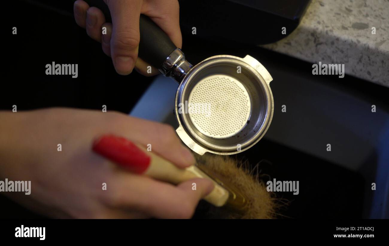 Blowing the steam tube of the coffee maker. Disinfection of dishes with ...