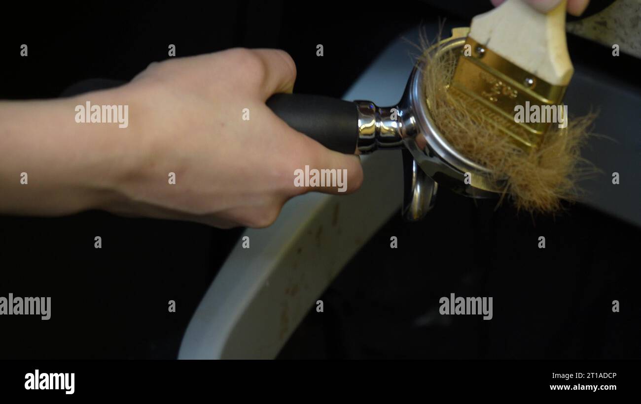 Blowing the steam tube of the coffee maker. Disinfection of dishes with ...