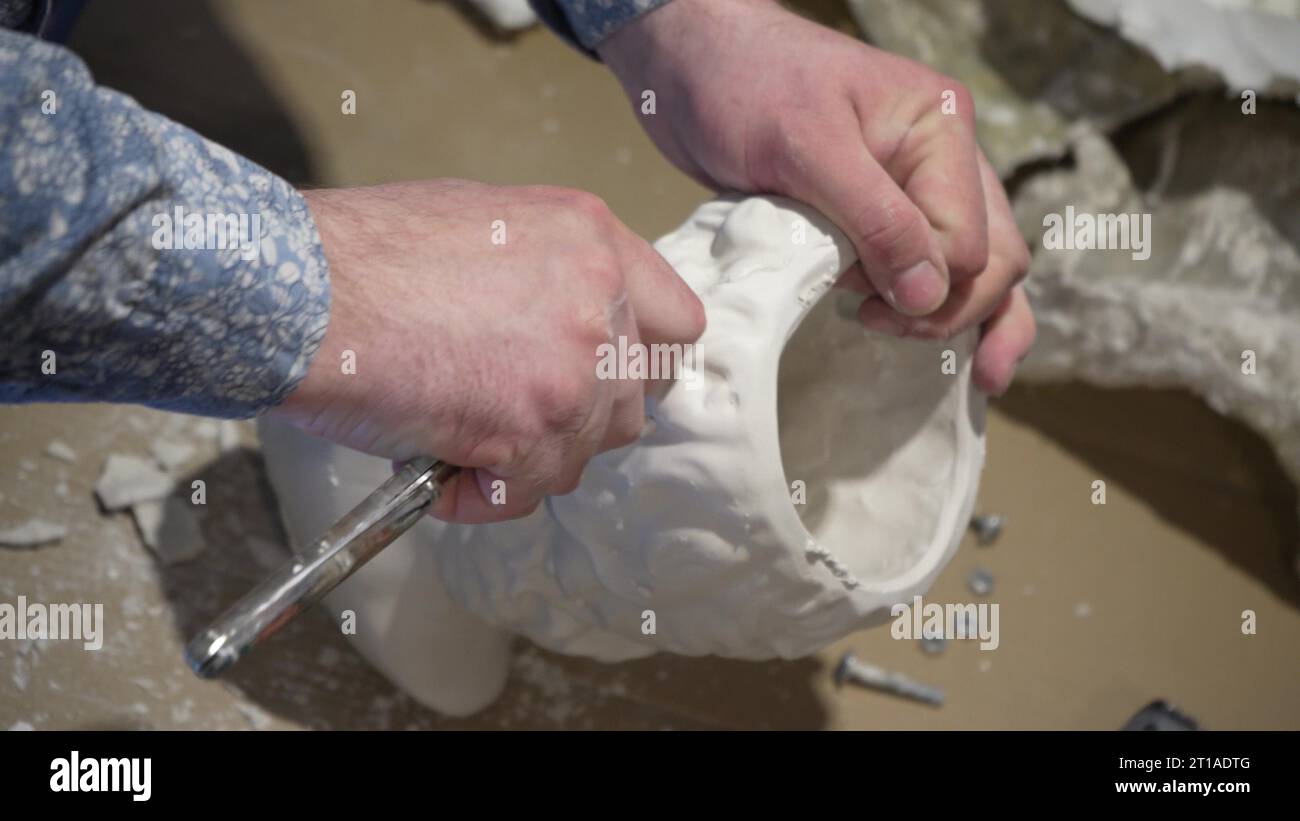 The process of processing and polishing plaster figures. A factory for ...