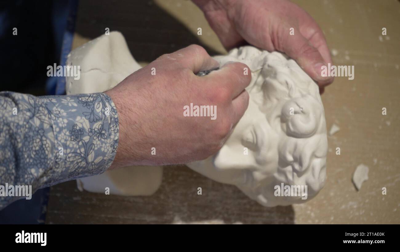 The process of processing and polishing plaster figures. A factory for ...