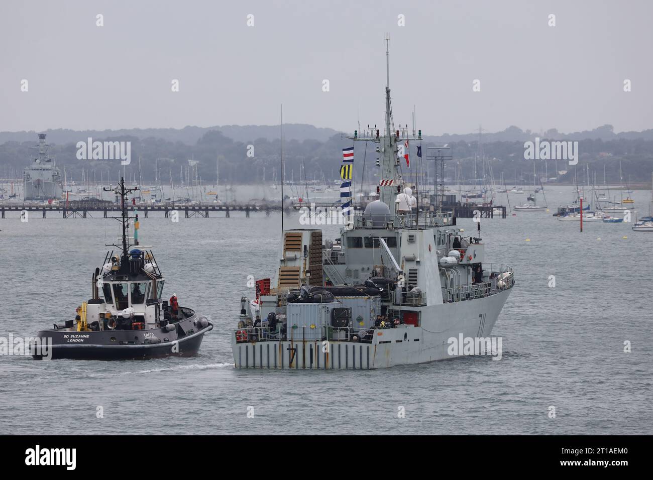 The Naval Base tug SUZANNE escorts the Canadian naval ship HMCS ...