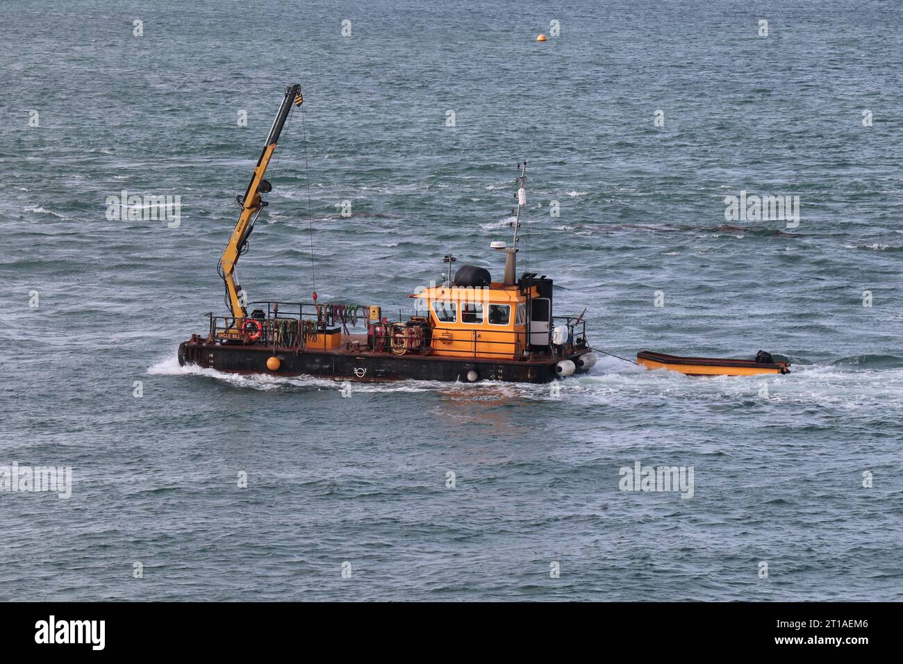 The multi-purpose work vessel UNCLE BILL heading out into The Solent ...
